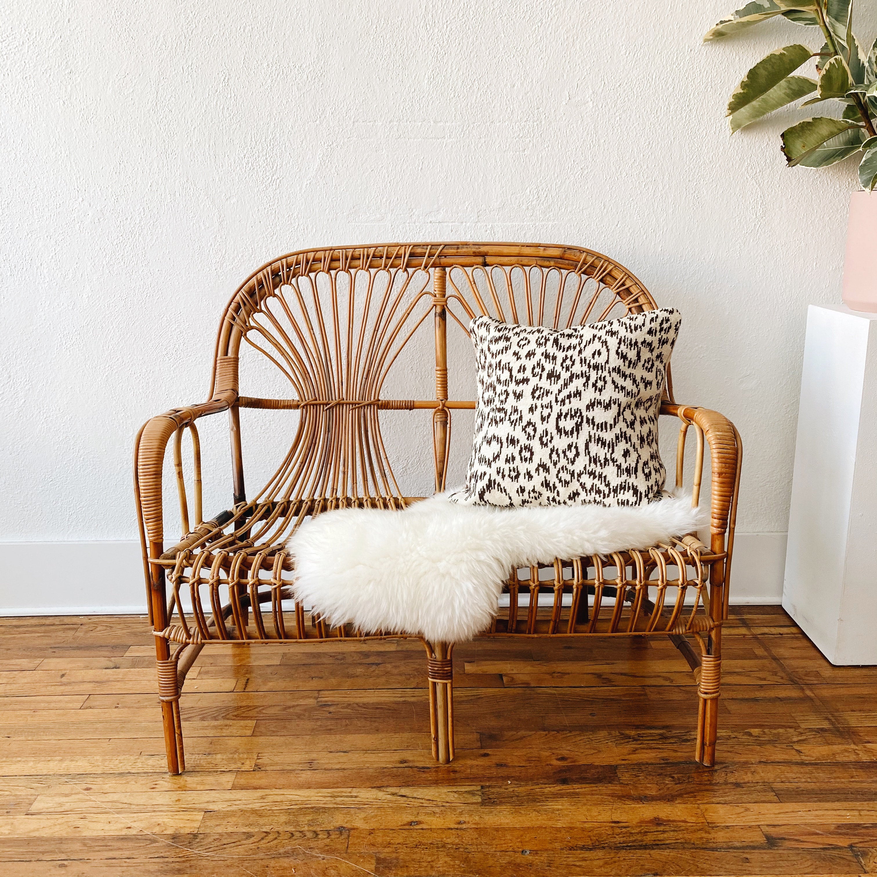 Vintage rattan loveseat | carousel + folk