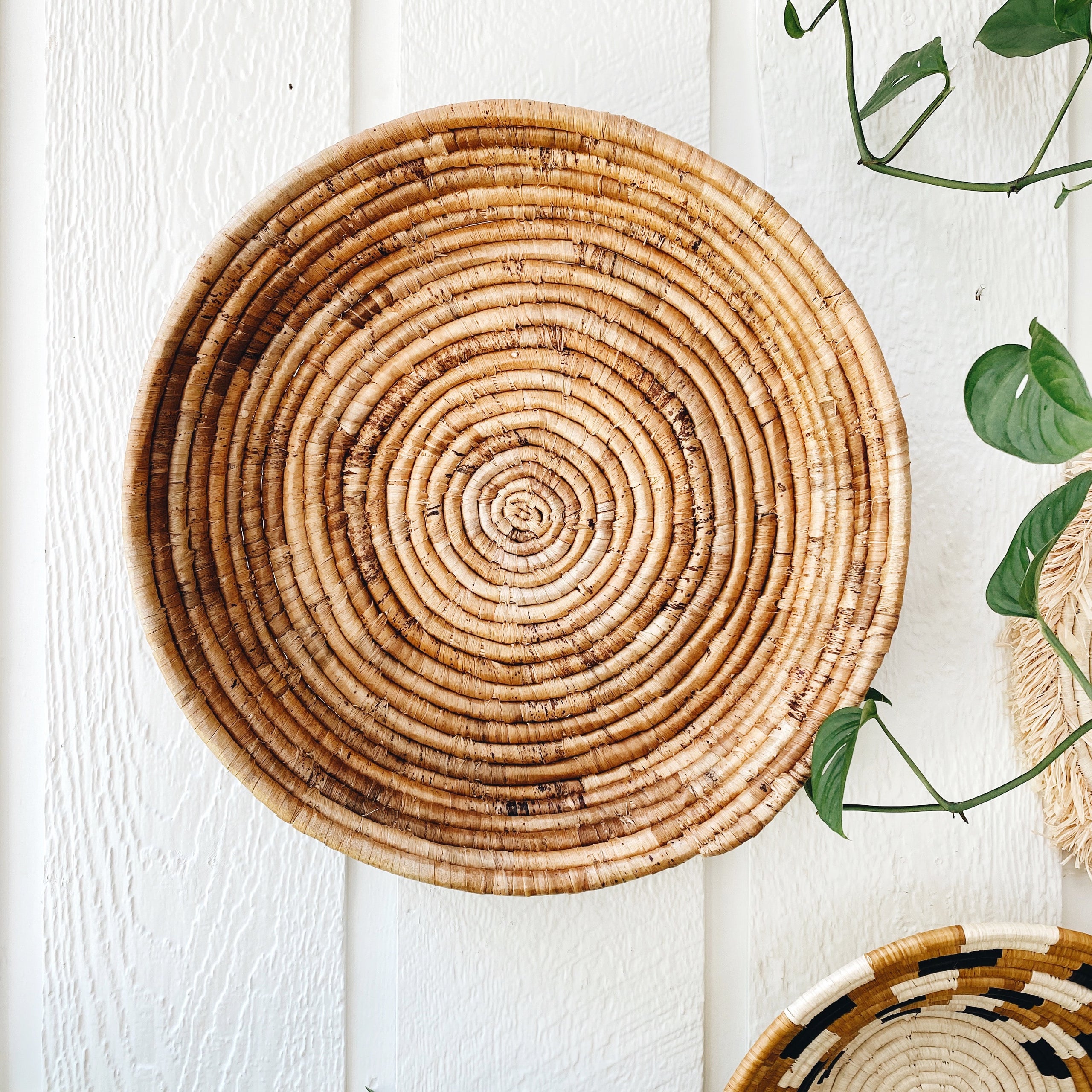 Banana Bark Round Raffia Tray by KAZI | carousel + folk